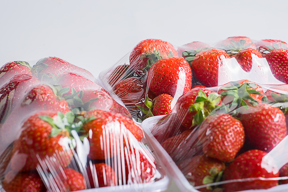 strawberries and shrink wrap - Produce Processing